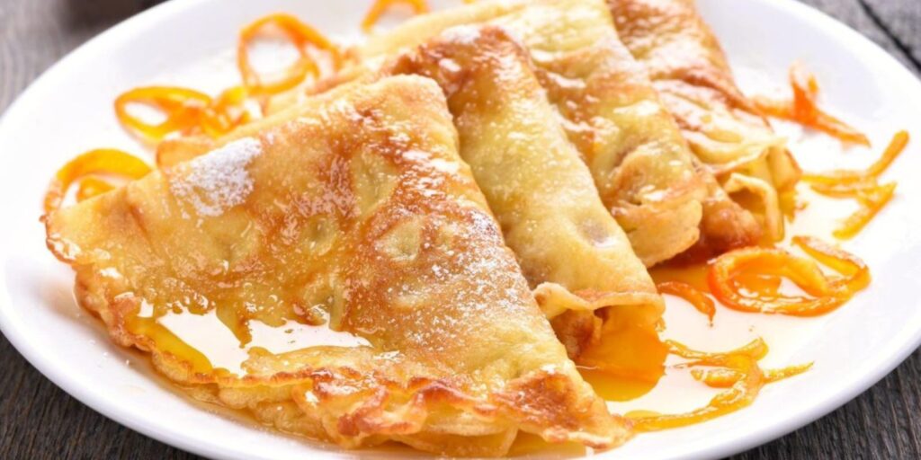Crêpes Suzette - Französische Pfannkuchen in Orangensoße - Rezepte & Tipps